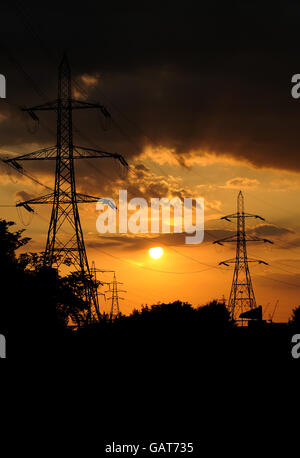 sunset behind pylons Stock Photo - Alamy