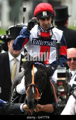 Jockey Alan Munro on Smokey Storm on the way to winning the Woodcote ...