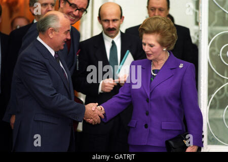 Prime Minister Margaret Thatcher shakes hands with Soviet President ...