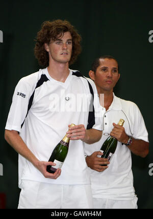Great Britain's Jamie Murray with South Africa's Jeff Coetzee during ...
