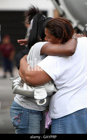 Mourners at the scene where 16-year-old Shakilus Townsend was stabbed ...