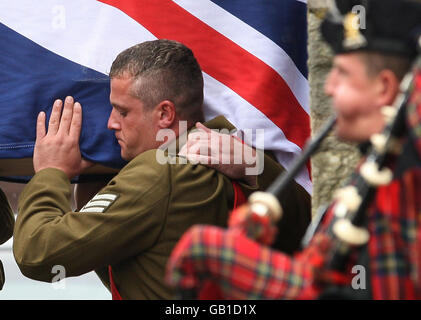 A coffin is carried out during the funeral of Samuel Puttick, 5, and ...