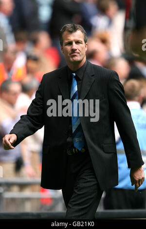 Former Coventry City player Keith Houchen signs prints during the ...