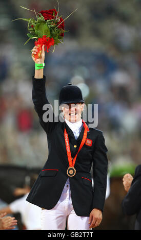 Great Britain's Tina Cook with the bronze medal that she won riding ...