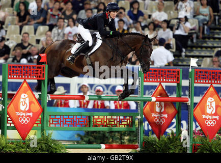 Great Britain's Tina Cook (centre) celebrates with William Fox-Pitt and ...