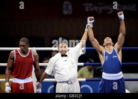Ireland's Darren John Sutherland (blue) in action against Venezuela's ...