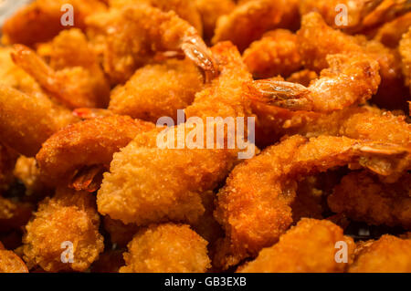 Large pile of popcorn shrimp tempura in buffet tray Stock Photo - Alamy