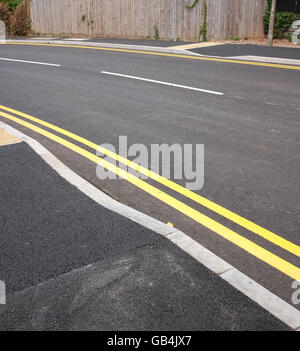 New dropped curbs installed on a section of new road in Cardiff, July ...