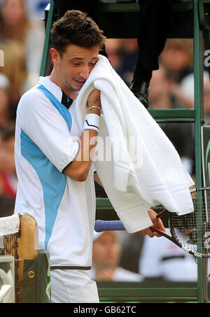 Alex Bogdanovic of Great Britain on his way to victory over Joachim ...