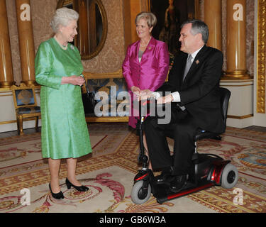 Queen Elizabeth II receives The Honourable Graydon Nicholas, Lieutenant ...