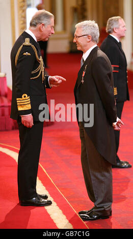 Entertainer Paul O'Grady, 53, at Buckingham Palace with daughter Sharyn ...