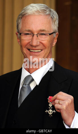 Entertainer Paul O'Grady, 53, at Buckingham Palace with daughter Sharyn ...