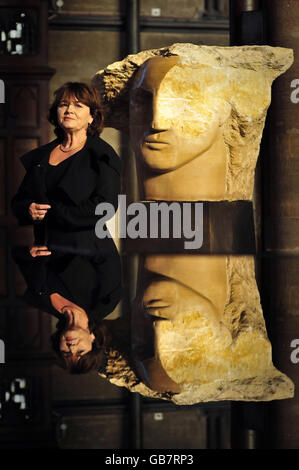 Contemporary sculptor Emily Young, stands by one of seven and a half ...