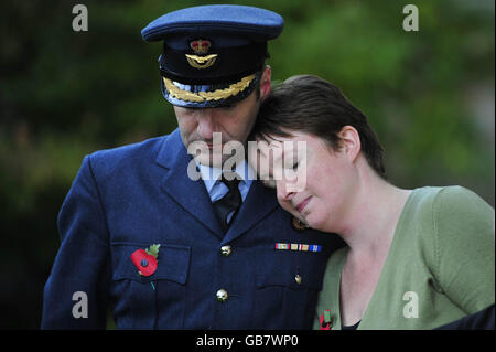 RAF Lyneham station commander Group Captain Mike Neville reads a ...