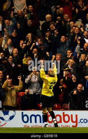 Watford's Lee Cook celebrates his equalising goal infront of the ...