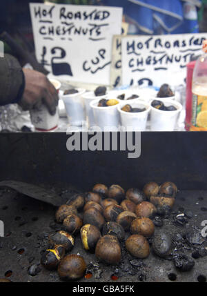 Chestnuts being roasted by a vendor on Oxford Street in London Stock ...