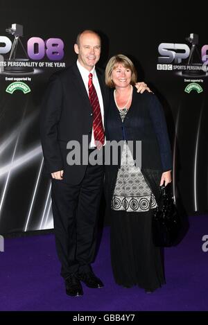 Sir Clive Woodward with his wife Jane arriving for the wedding of Zara ...