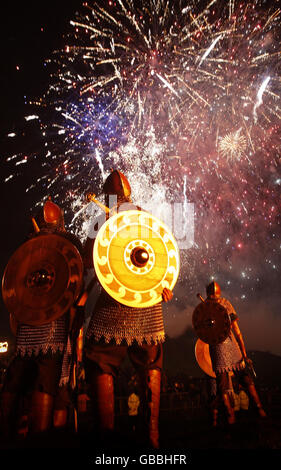 Vikings on Carlton Hill watch fireworks during the torchlight parade as ...