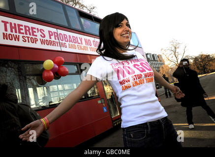 Guardian journalist Ariane Sherine wears a t-shirt displaying an ...