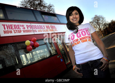 Guardian journalist Ariane Sherine wears a t-shirt displaying an ...