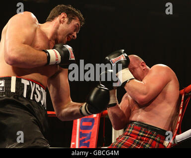 Tyson Fury (left) beats Marcel Zeller on the undercard of the British ...