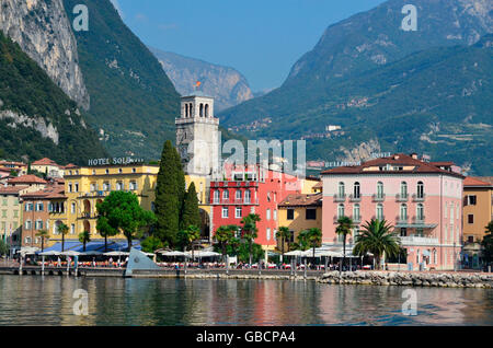 Promenade in Riva del Garda with view on lake and mountain Stock Photo ...