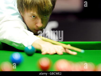 Judd Trump of England plays a shot to Thepchaiya Un-Nooh of Thailand at ...