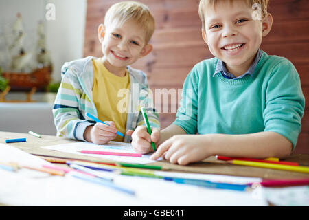Siblings coloring pictures Stock Photo - Alamy
