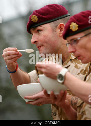 Air-to-air left side view of an F-16 Fighting Falcon aircraft armed ...