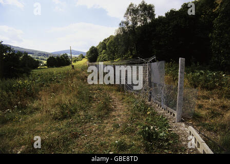 The inner German border with wall, border fence and guard tower between ...