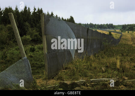 The inner German border with wall, border fence and guard tower between ...