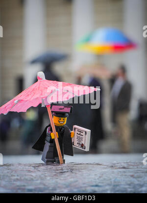 Graduation Lego man in rain Stock Photo - Alamy