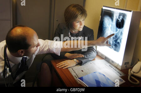 Health Secretary Nicola Sturgeon with Doctor Ewan Forrest and Senior ...