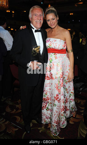 Bruce Forsyth television entertainer with arm round wife Anthea Redfern ...