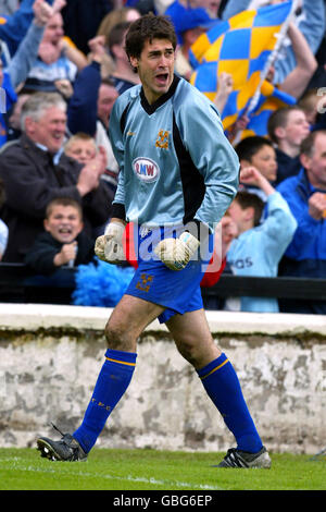 Shrewsbury Town's goalkeeper Scott Howie makes a save during the ...