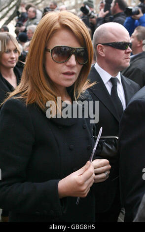 A mourner following the funeral of singer-songwriter Gerry Rafferty at ...