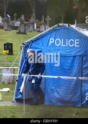 Police exhume unidentified body Stock Photo - Alamy
