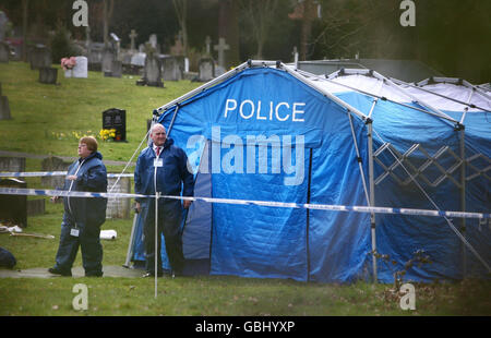 Police exhume unidentified body Stock Photo - Alamy