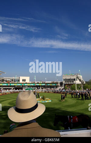 Horses are paraded round the pre parade ring before the race Stock ...