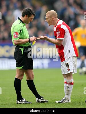 Charlton Athletic's Nick Bailey pleads with referee Lee Probert after ...