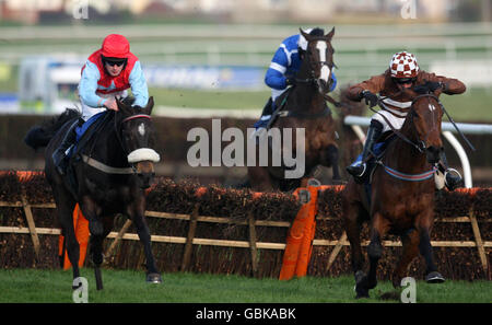 Solway Sunset ridden by Ewan Whillans (left) leads Sheriff Hutton ...