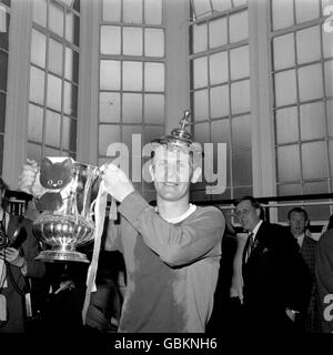 Everton captain Brian Labone (5) shows the FA Cup to the team's ...