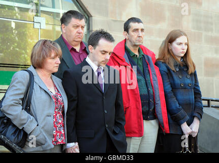 Matthew Pyke's girlfriend Joanna Witton listens to a statement being ...