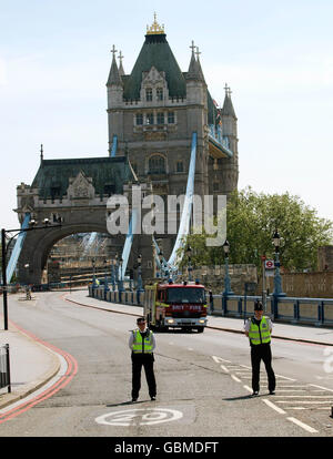 Police keep the road on London's Tower Bridge closed after an elevator ...