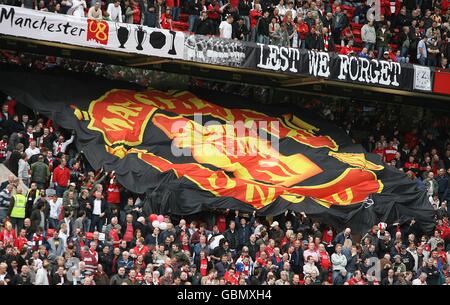 Manchester United fans unveil a banner in protest of increased matchday ...