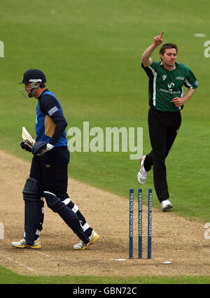 Hampshire's Dominic Cork celebrates taking the wicket of Matt Prior ...