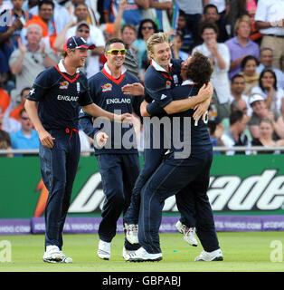 England's players celebrates the wicket of India's Hardik Pandya during ...
