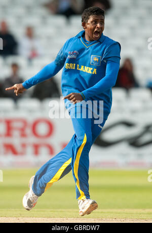 Sri Lanka's Ajantha Mendis celebrates amongst teammates, left, after ...