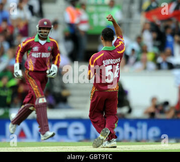 West Indies players celebrate taking the wicket of Sri Lanka's ...