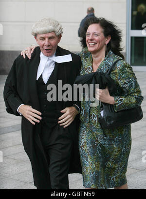 Sunday Tribune journalist Suzanne Breen (centre) outside the High Court ...